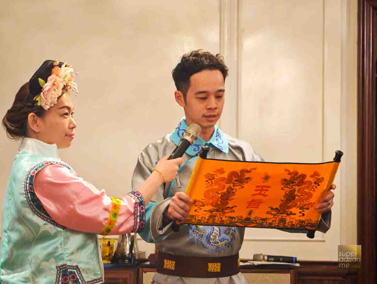 Staff dressed in period attire for the Manchu Han Imperial Feast at Man ...